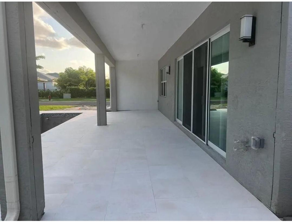 White Emperador Marble Tiles for floor and walls.