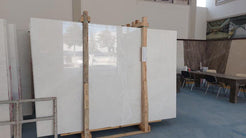 White Emperador Marble Tiles for floor and walls.